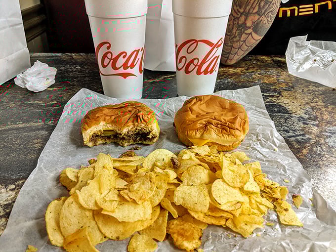 The holy trinity of American lunch – sandwiches, chips, and fountain Coke served on wax paper instead of fine china.
