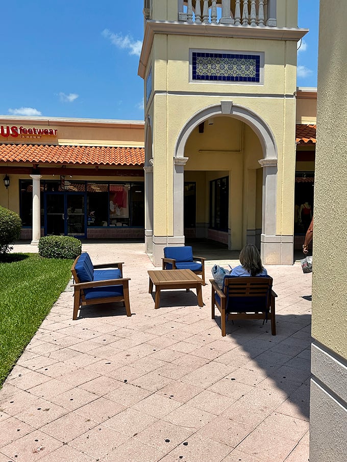 These comfortable seating areas are the unsung heroes of outlet shopping—strategic rest stops for weary partners and teenagers who've reached their shopping tolerance threshold.