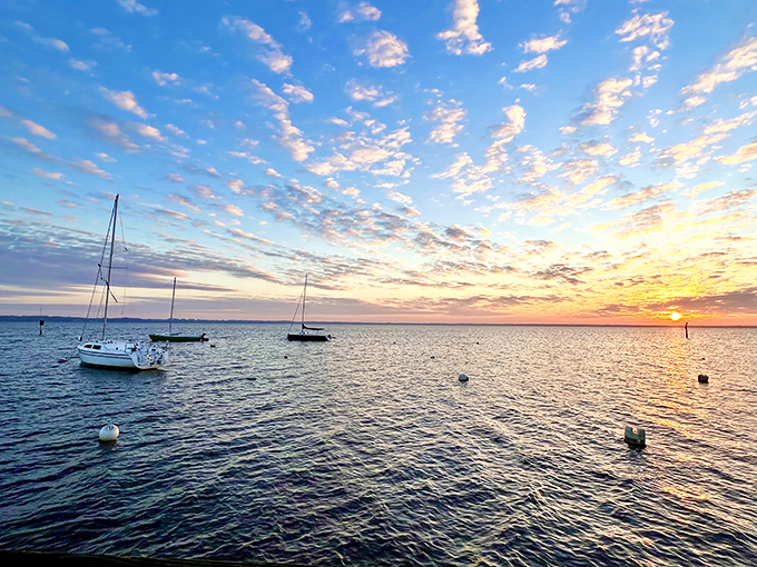 The kind of sunset that makes you question every life choice that doesn't involve living near this lake permanently.