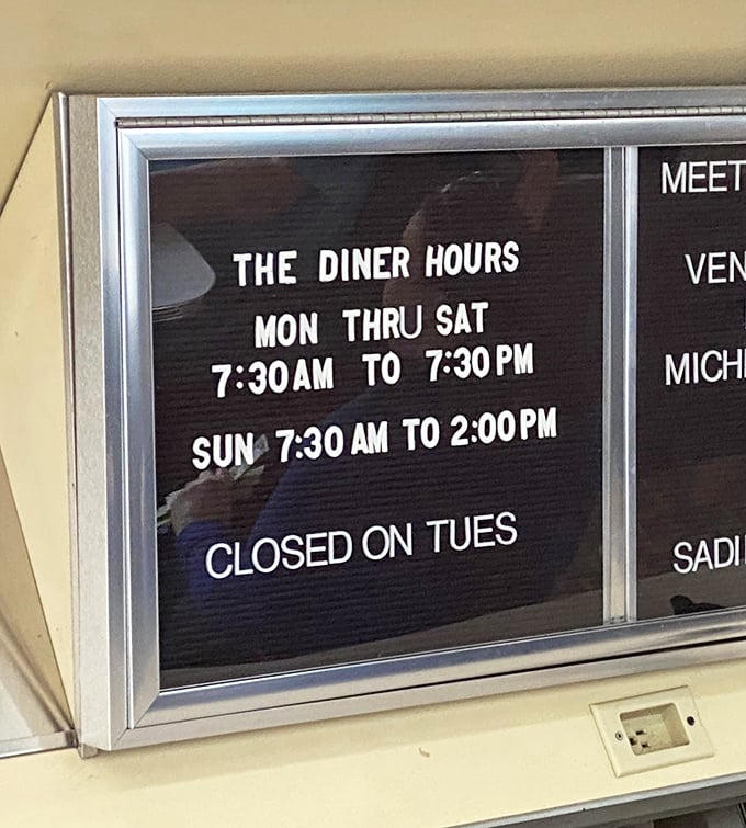 The hours posted like a promise: "We'll be here when you need us." Except Tuesdays—even diner magic needs a day to recharge.
