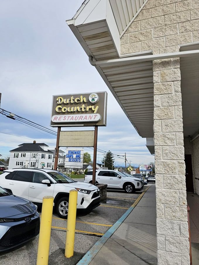 The sign that's guided hungry travelers for decades, standing sentinel over a parking lot that fills with knowing locals at precisely 7am and noon.