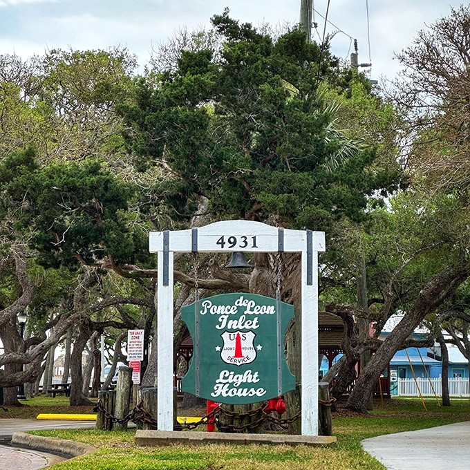 The sign says it all—you've arrived at a National Historic Landmark that's been guiding visitors and vessels alike for generations.
