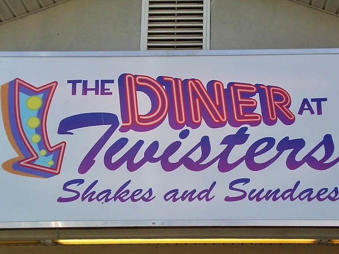 The neon-bright sign promises two worlds under one roof—diner classics and frozen delights. It's not just a logo; it's a beacon of deliciousness.