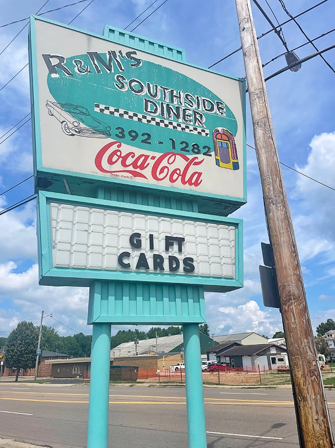The roadside beacon that's guided hungry travelers for generations. That turquoise sign promises salvation for empty stomachs.