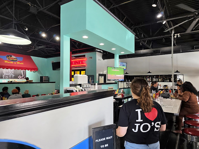 Staff wearing "I ❤️ Jo's" shirts aren't just employees—they're ambassadors of comfort food diplomacy, bringing peace through perfect portions.