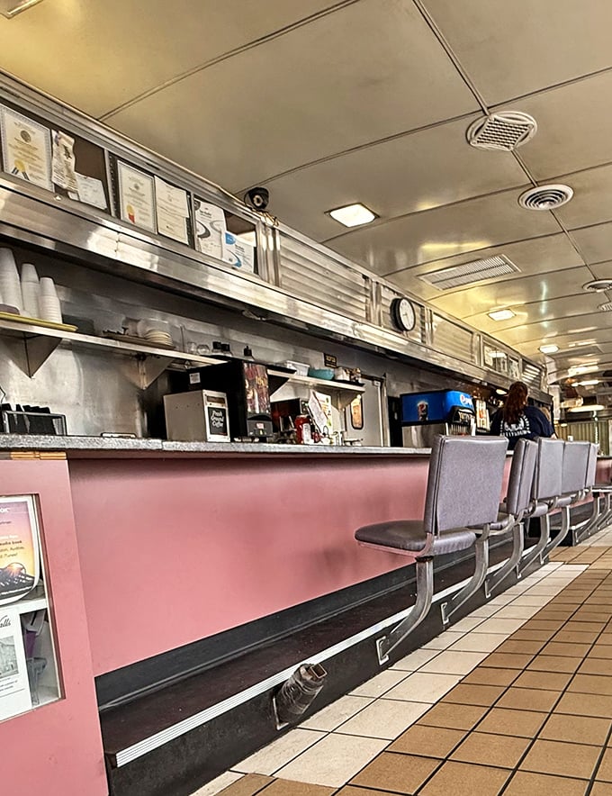 The counter view—where coffee cups are always full, orders fly through the air, and breakfast dreams come true.