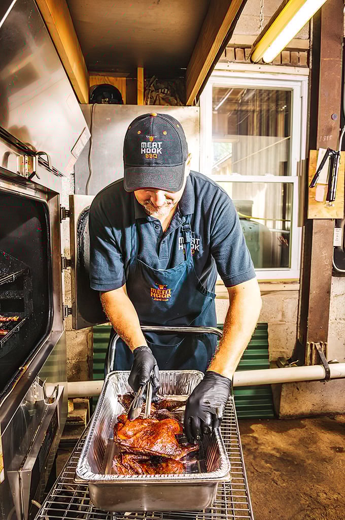 That pitmaster's concentration rivals a surgeon's – except the stakes here are much more delicious.