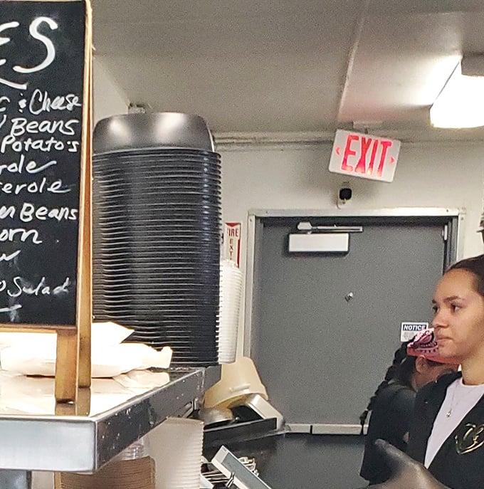 The chalkboard of sides – where the supporting actors in the barbecue drama get their moment to shine. Don't sleep on those green beans!