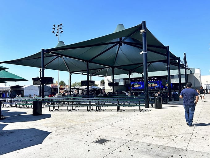 The community heart of the swap meet—this covered stage area hosts everything from local bands to cultural celebrations throughout the year.