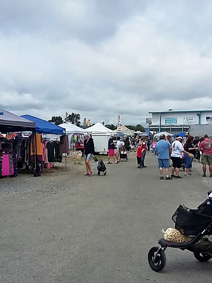 The outdoor market buzzes with activity under cloudy skies, proving that neither rain nor shine will deter dedicated treasure hunters.