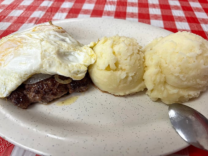 Steak and eggs – breakfast's power couple. Two scoops of mashed potatoes on the side because sometimes more is exactly enough.