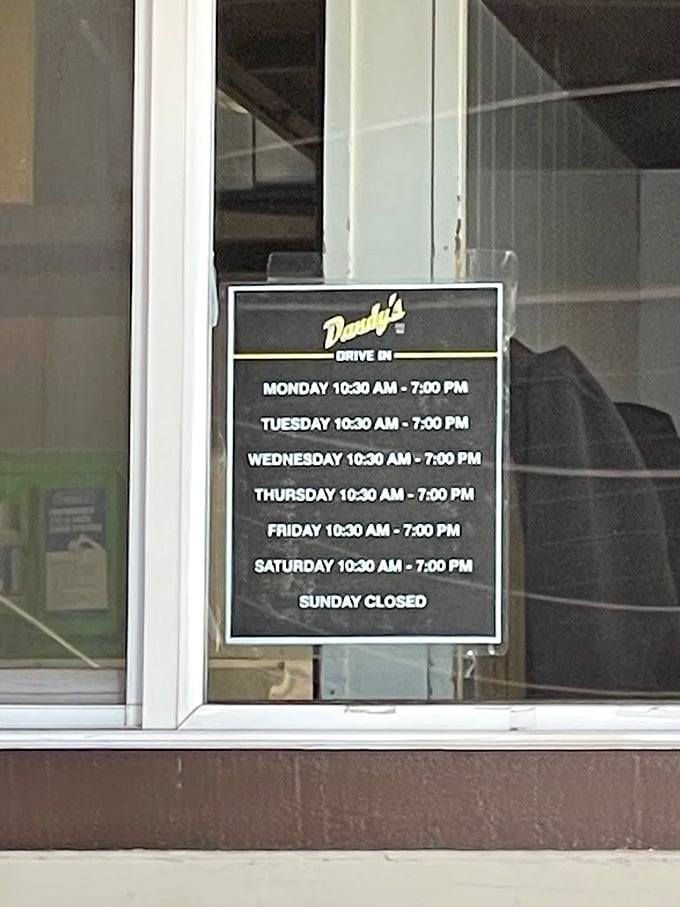 Store hours posted clearly because even legends need their beauty sleep – except Sundays, apparently they rest.