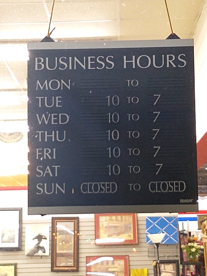 Business hours posted clearly ensure treasure hunters can plan their thrift store adventures during convenient shopping times perfectly.