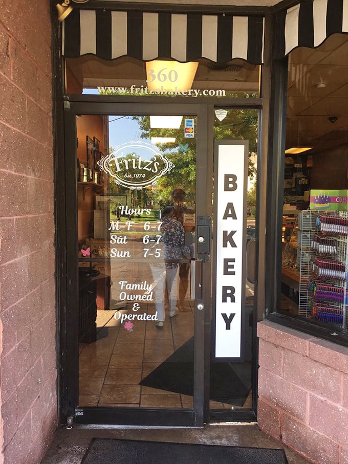 The entrance tells you everything you need to know—family-owned, established traditions, and hours that require bakers to rise before the sun.