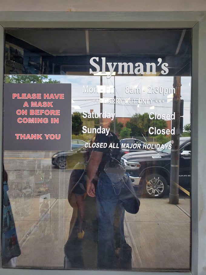 Hours posted clearly—because knowing when you can get your next Slyman's fix is serious business in Cleveland.
