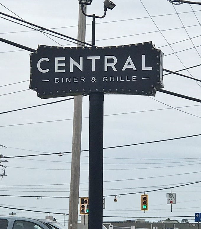 The sign stands tall against Pittsburgh's gray skies, a beacon guiding hungry travelers to comfort food salvation.