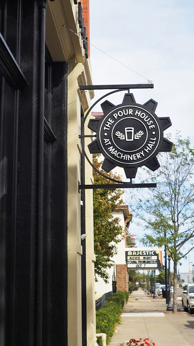 The Pour House sign swings gently above Chillicothe's sidewalks, a beacon for hungry travelers and locals alike seeking refuge from ordinary meals.
