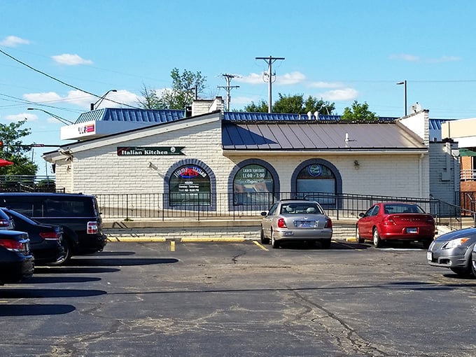 The restaurant's exterior view from the parking lot—where hungry patrons arrive with high hopes and leave with happy stomachs.