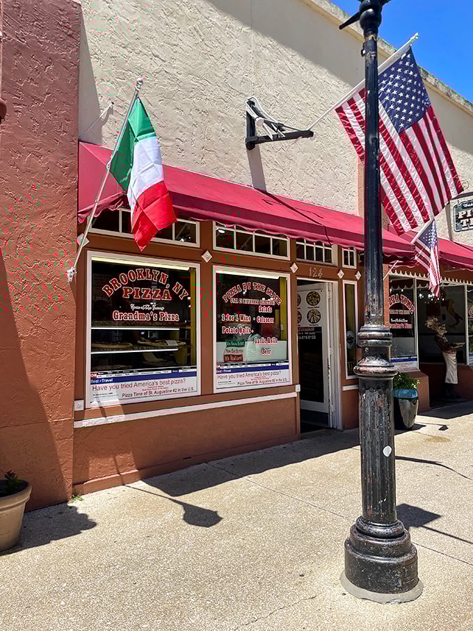 The Italian flag flies proudly alongside Old Glory—a perfect symbol for this cultural marriage that produced America's most beloved adopted food tradition. 