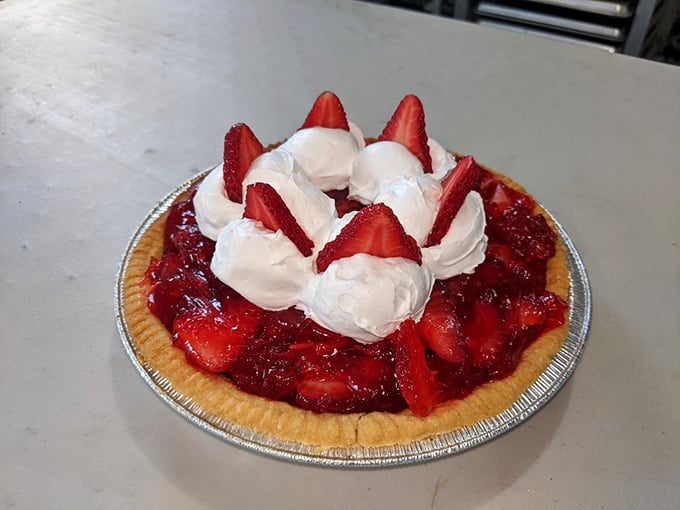 A strawberry pie that's basically summer on a plate—complete with those whipped cream dollops that dreams are made of.