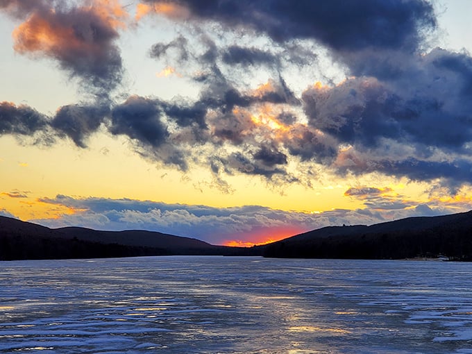 Sunset paints the winter lake in impossible colors – Mother Nature showing off her evening palette just because she can.