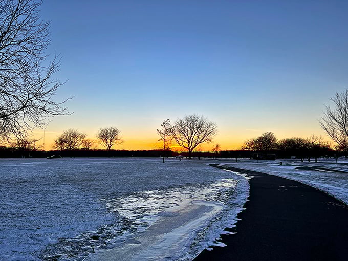 Winter sunset magic hour—when the day's last light turns even a snow-covered path into something worthy of framing above your fireplace.