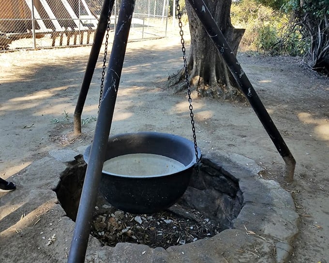 This hanging pot and fire pit arrangement was the pioneer equivalent of a high-end kitchen—the original farm-to-table dining experience.