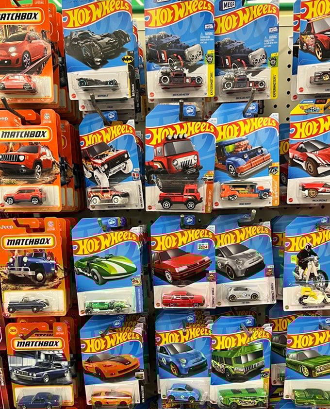 Hot Wheels and Matchbox cars lined up like tiny automotive dreams, where collectors and kids alike find miniature joy at minimal cost.