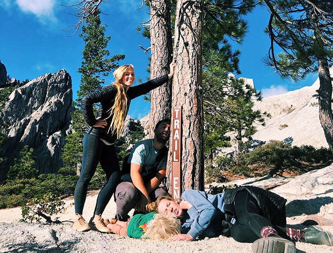 Trail markers remind adventurers they've reached a milestone. The real journey, as any hiking philosopher will tell you, was the friends we made along the way.