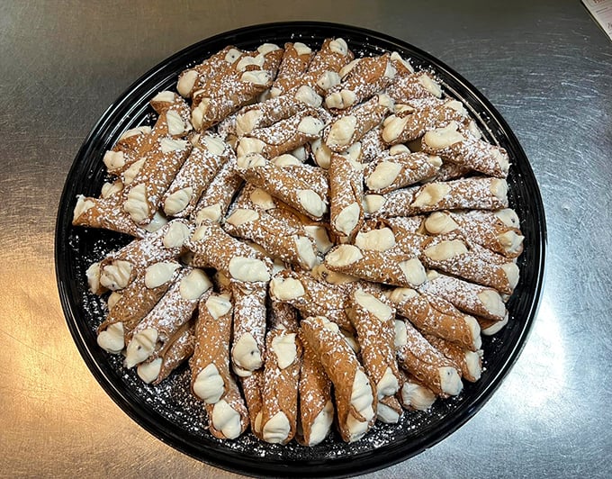 These cannoli aren't just desserts—they're edible exclamation points at the end of a meal, crispy shells filled with sweet, creamy punctuation.