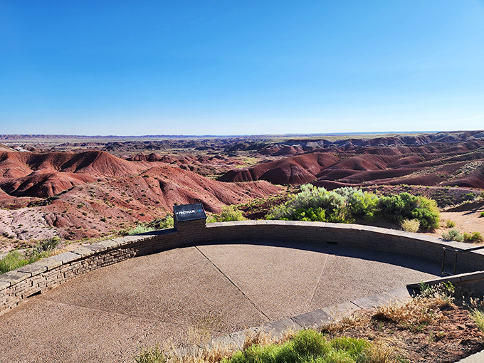 Nature's amphitheater awaits your appreciation. This viewing platform frames the painted landscape like the masterpiece it truly is.
