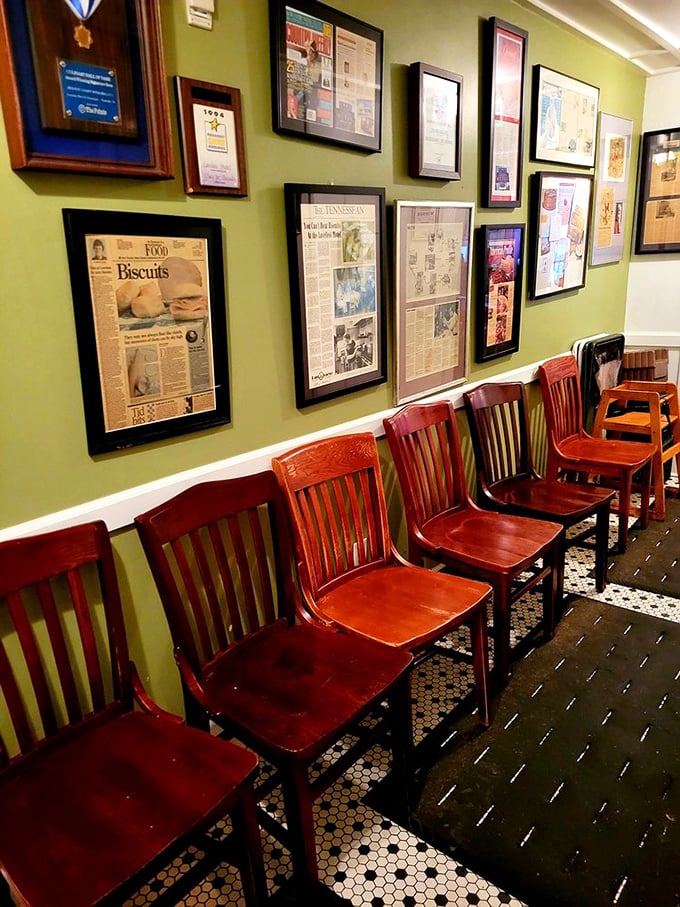 A wall of accolades and press clippings—silent testimony that some places become institutions not through marketing, but through consistent excellence.