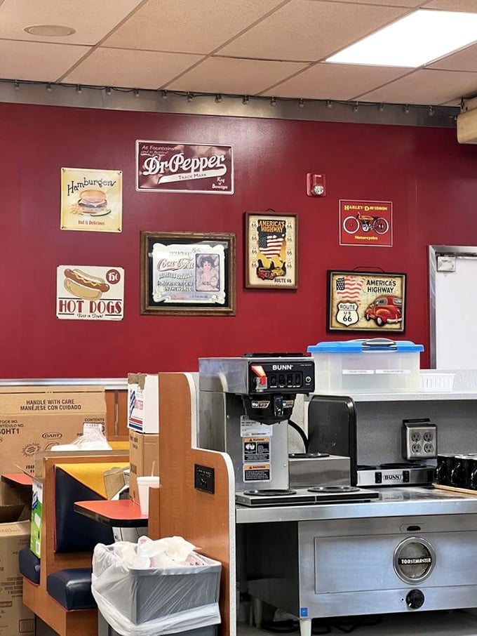 Vintage signs adorn walls that have heard thousands of breakfast orders. That Dr. Pepper sign has seen things—delicious, syrupy things.