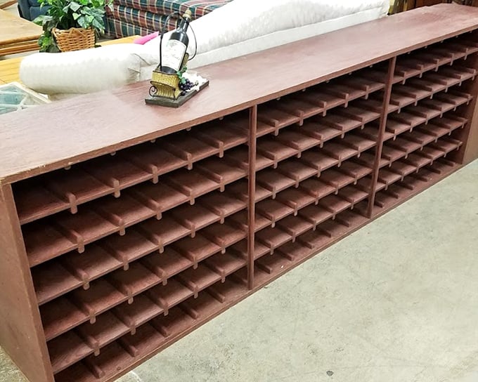 This wine rack isn't just furniture—it's an invitation to fill each cubby with bottles and stories, creating your own personal vineyard library.
