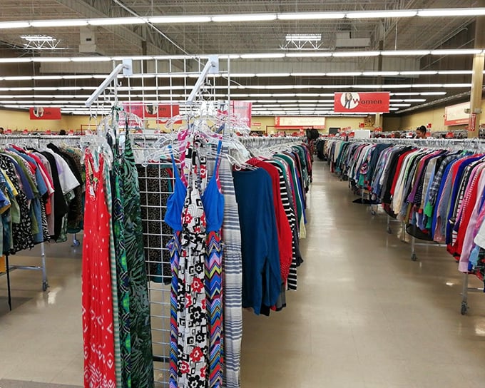 Fashion democracy in action—designer dresses hang alongside everyday wear. The thrill is finding that perfect pattern that speaks to your personal style.