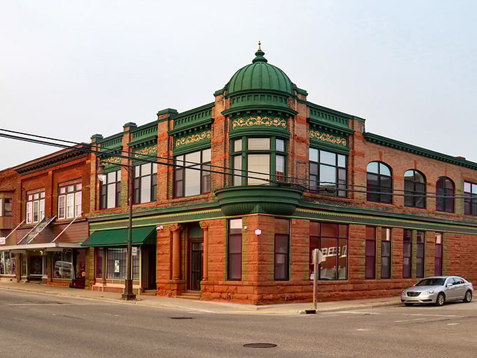 Manistique's colorful downtown buildings line up like a box of crayons that decided to become architecture instead.
