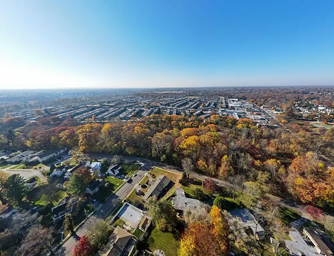 From above, Brookville reveals its perfect balance – nestled in nature's embrace while offering all the comforts of civilization.