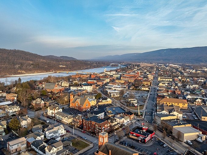 From above, Lock Haven reveals its perfect positioning between river and mountains. Nature didn't just surround this town—it embraced it.