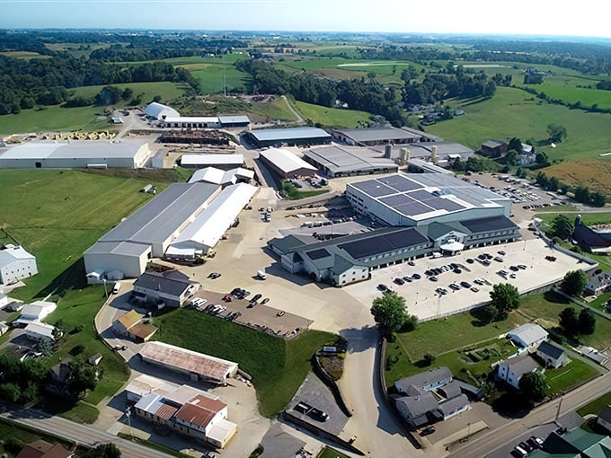 An aerial view reveals Charm's surprising scale, where businesses and farms coexist in a patchwork quilt of commerce and agriculture.