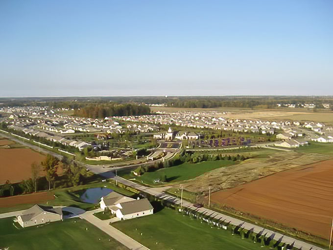 The big picture reveals Pioneer Ridge's thoughtful design—a community nestled between rural tranquility and convenient access to everyday necessities.