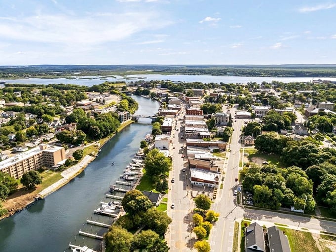 From above, Manistee reveals its perfect positioning – a town embraced by river and lake, with nature's bounty just beyond its orderly streets.