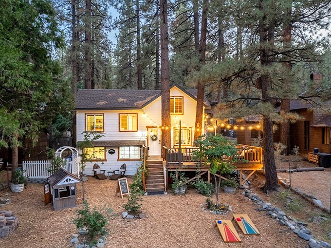 String lights and a welcoming porch – because mountain homes understand that ambiance doesn't require a complicated app or remote control.