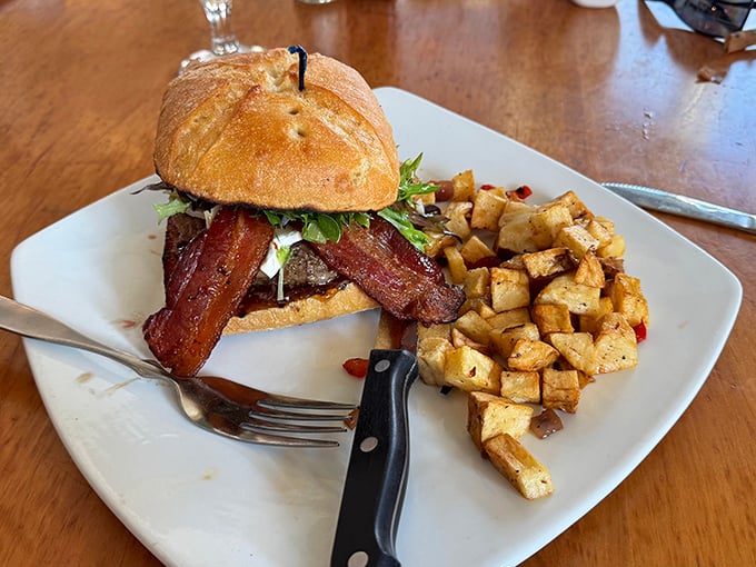 This burger isn't messing around. Those bacon strips aren't just toppings—they're making a statement about commitment to flavor.