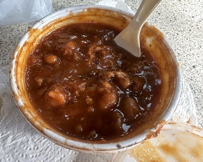 These beans have been to finishing school—they've learned the art of absorbing smoke flavor while maintaining their dignity in a sea of sauce.