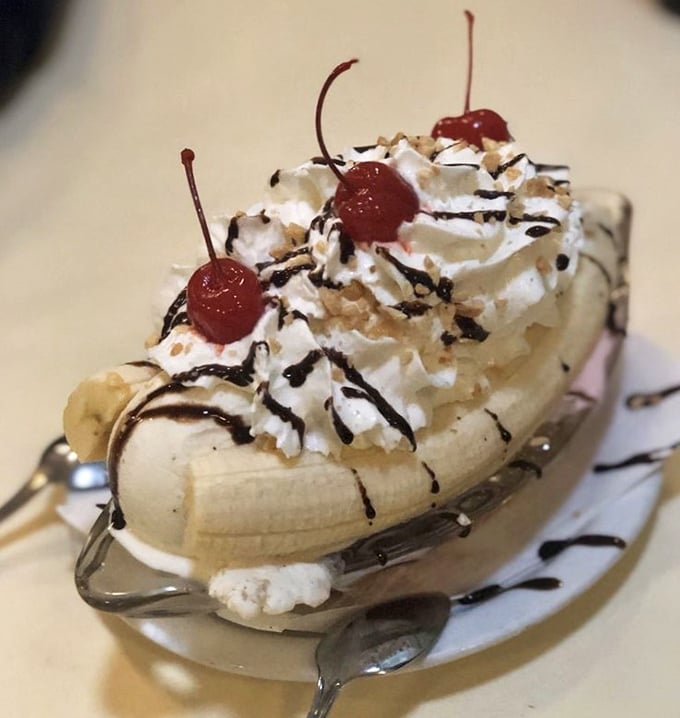 The banana split—dessert's answer to the three-act play. A sweet drama that unfolds with each spoonful, complete with cherry epilogue.