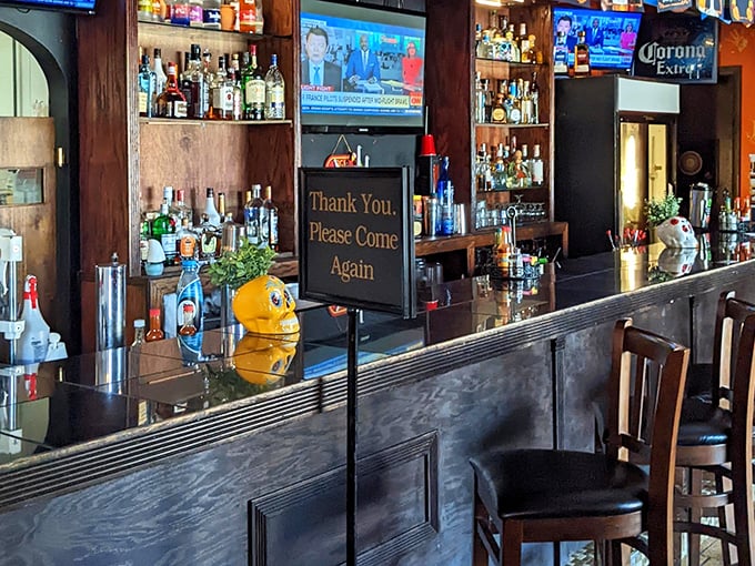 A bar that says "siesta can wait" – where tequila bottles stand like soldiers ready to transform your Tuesday into a celebration.
