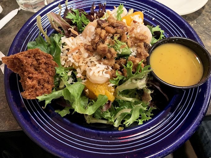 A salad that refuses to be boring – crisp greens playing host to a gathering of textures and flavors. Proof that healthy eating doesn't have to feel like punishment.