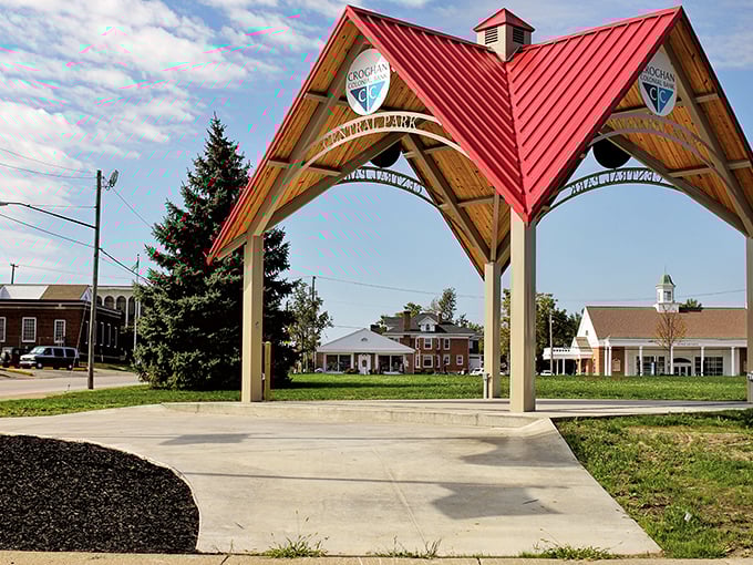 This welcoming pavilion isn't just an architectural feature—it's Bellevue's front porch, inviting everyone to gather under its distinctive red roof.