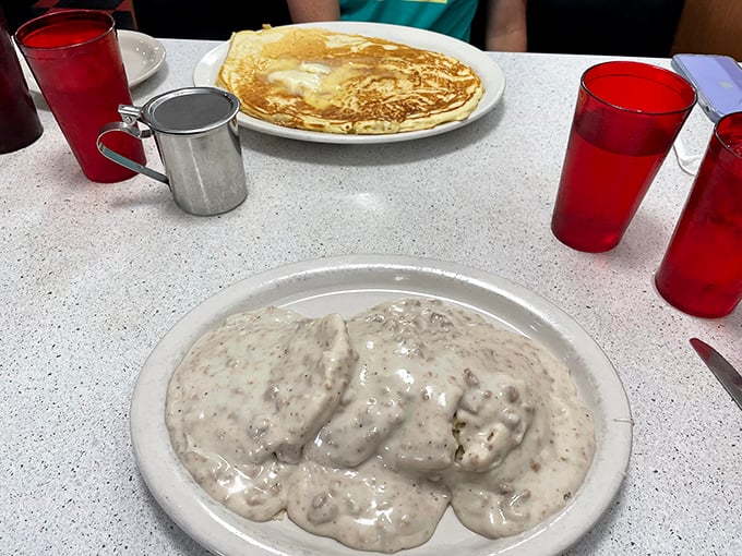 Biscuits and gravy – the comfort food equivalent of a warm hug from your favorite grandparent. Simple, honest, and absolutely perfect.