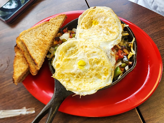Breakfast skillets: where vegetables pretend to make the meal healthy while eggs and cheese wink knowingly at your delighted taste buds.